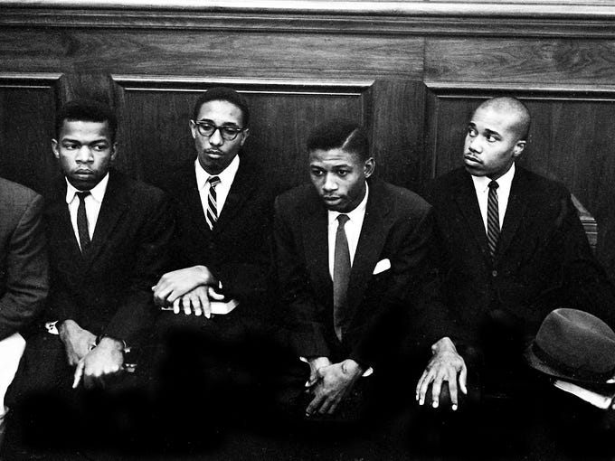 John Lewis: Every "bruise, scar" was a 'badge of honor'