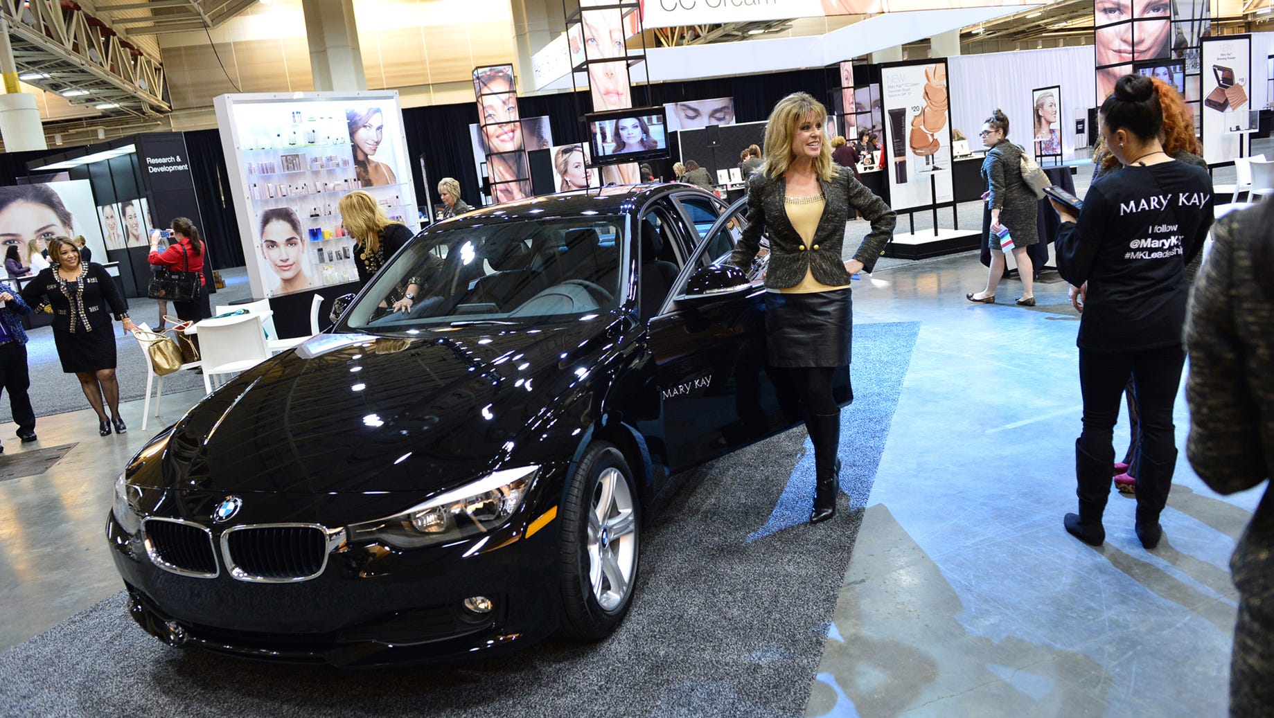 BMWs joins pink Cadillacs in Mary Kay's fleet
