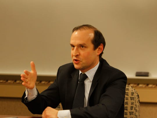 Purdue dean shrinks graduate pool to boost pay