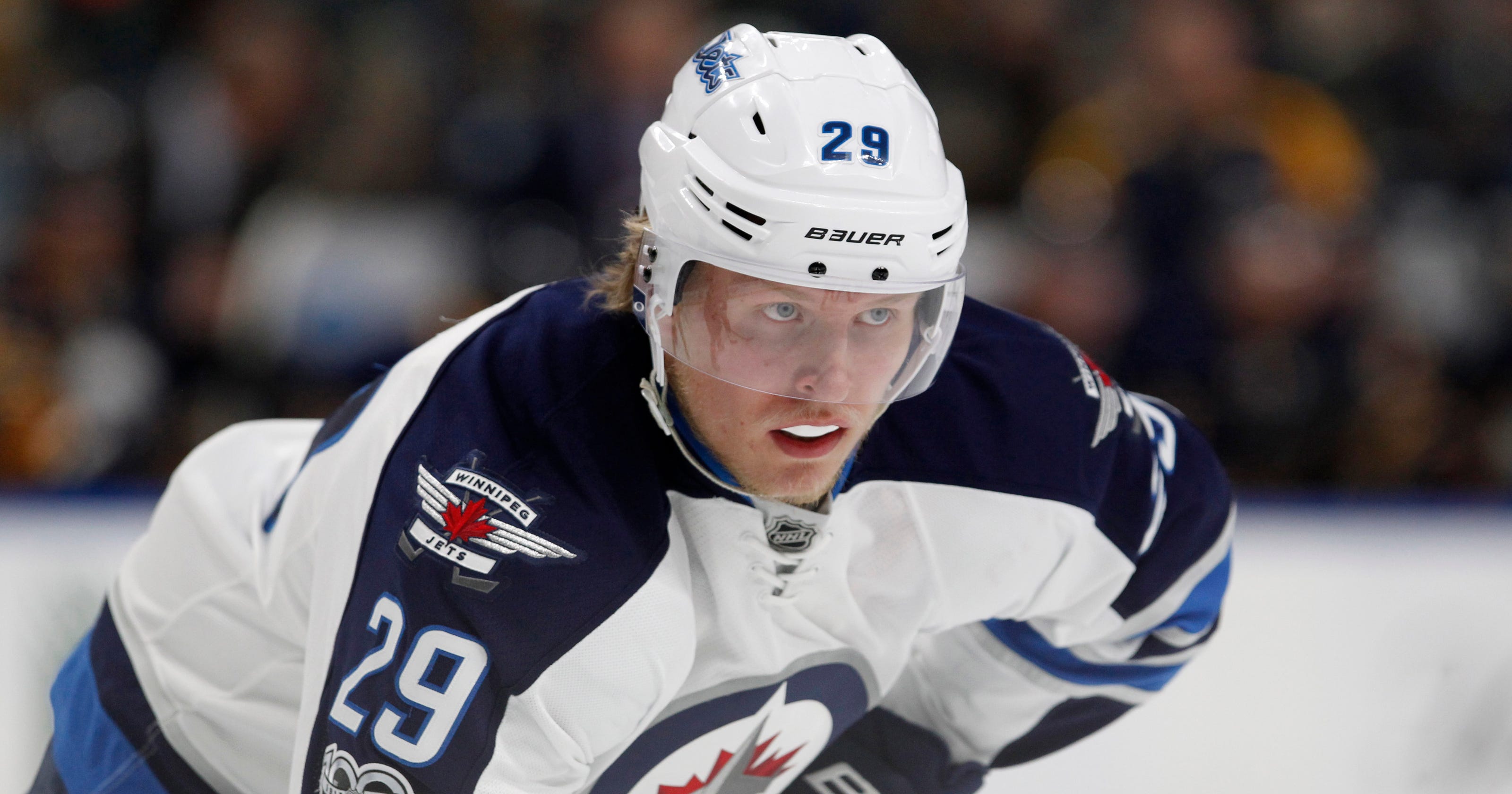 Jets' Patrik Laine leaves game after huge hit near center ice