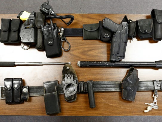 At 30 lbs., police gear more than guns, cuffs