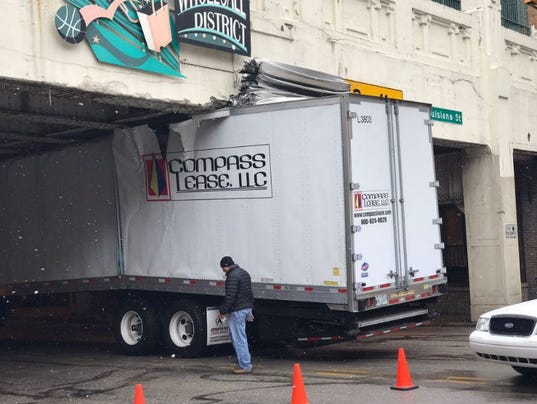 Portion of Meridian Street closed after semi hits bridge in Downtown ...