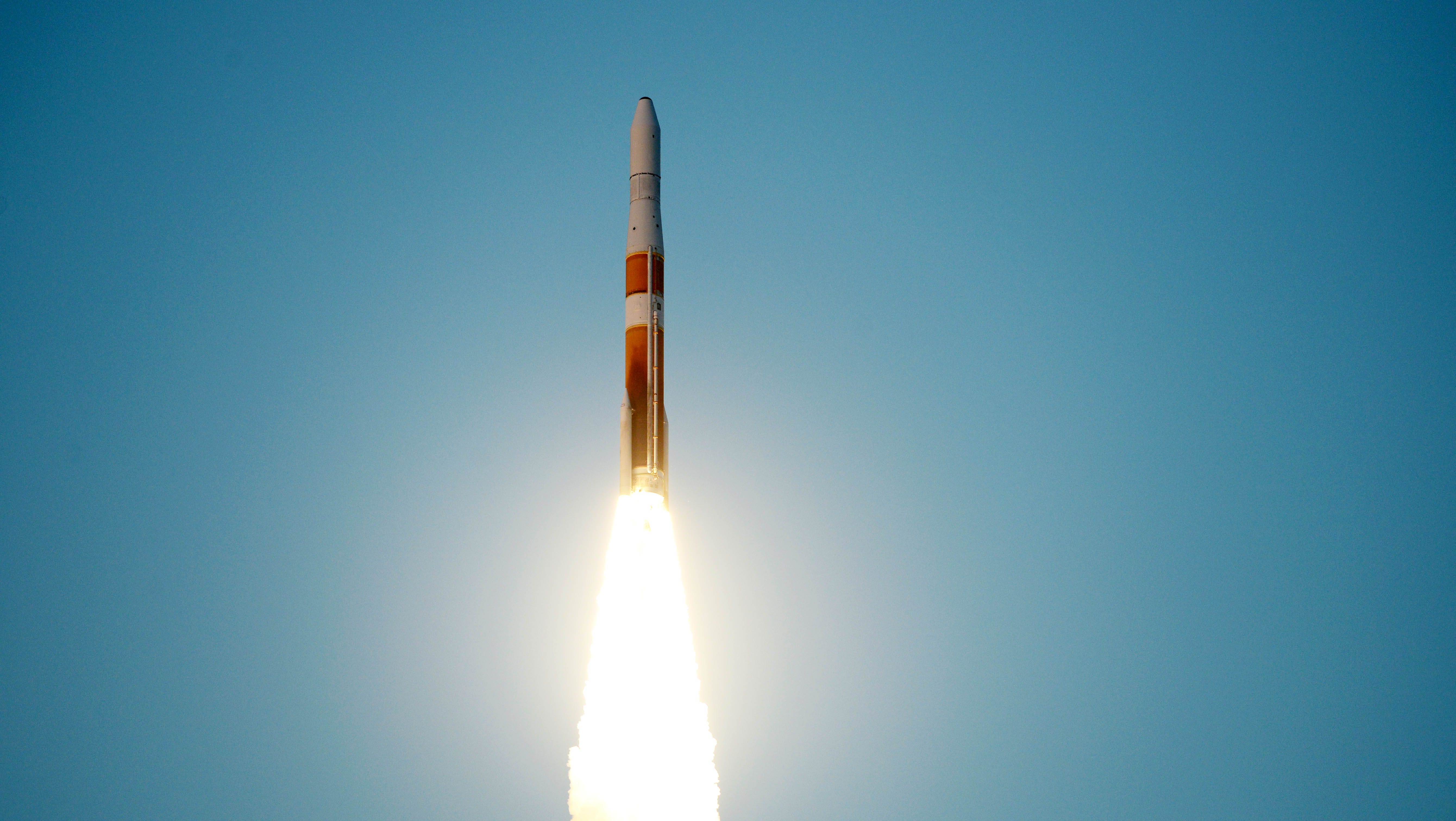 Rocket soars at sunset from Cape Canaveral