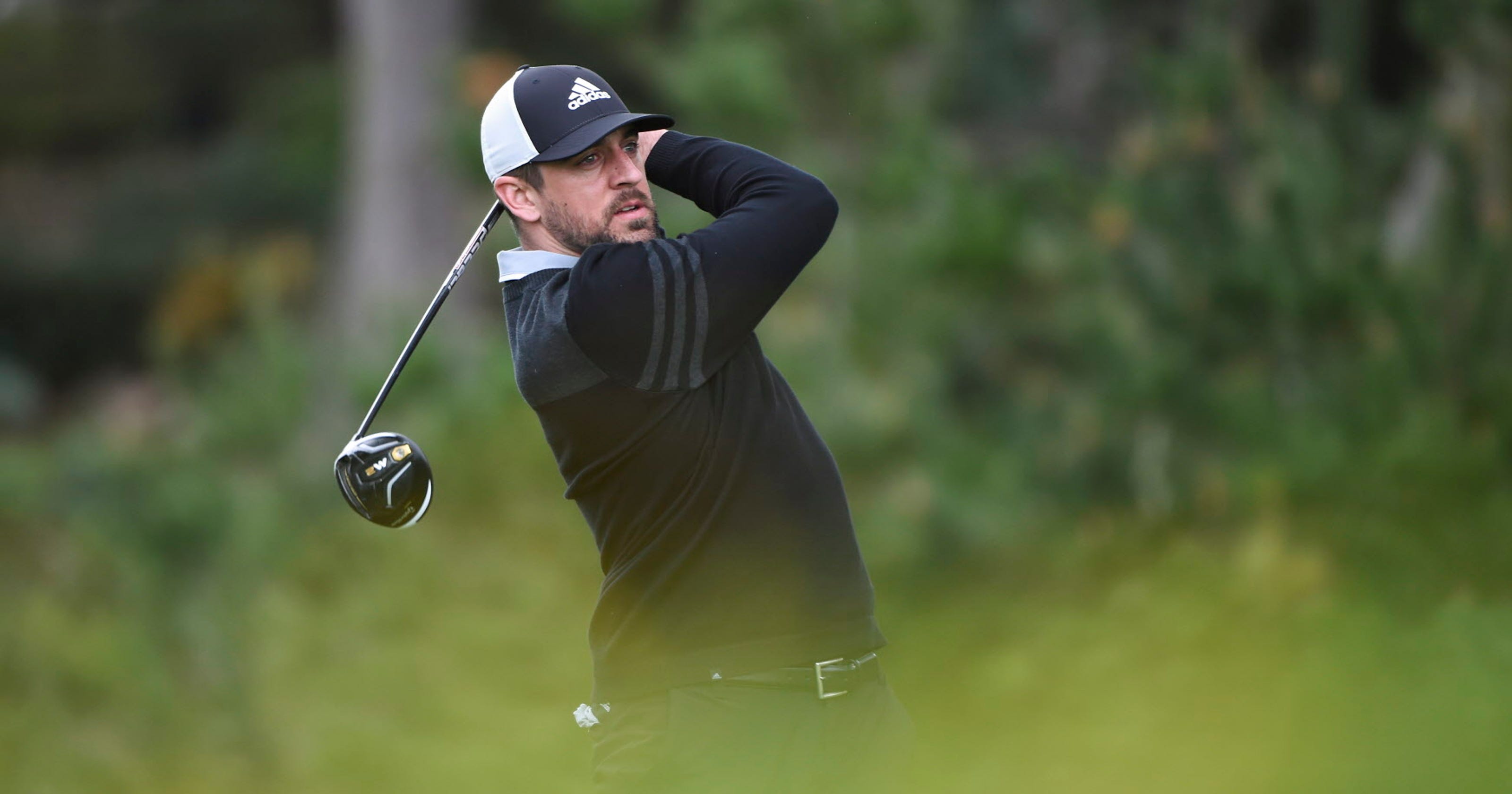 Packers quarterback Aaron Rodgers is displaying golf skills at ...