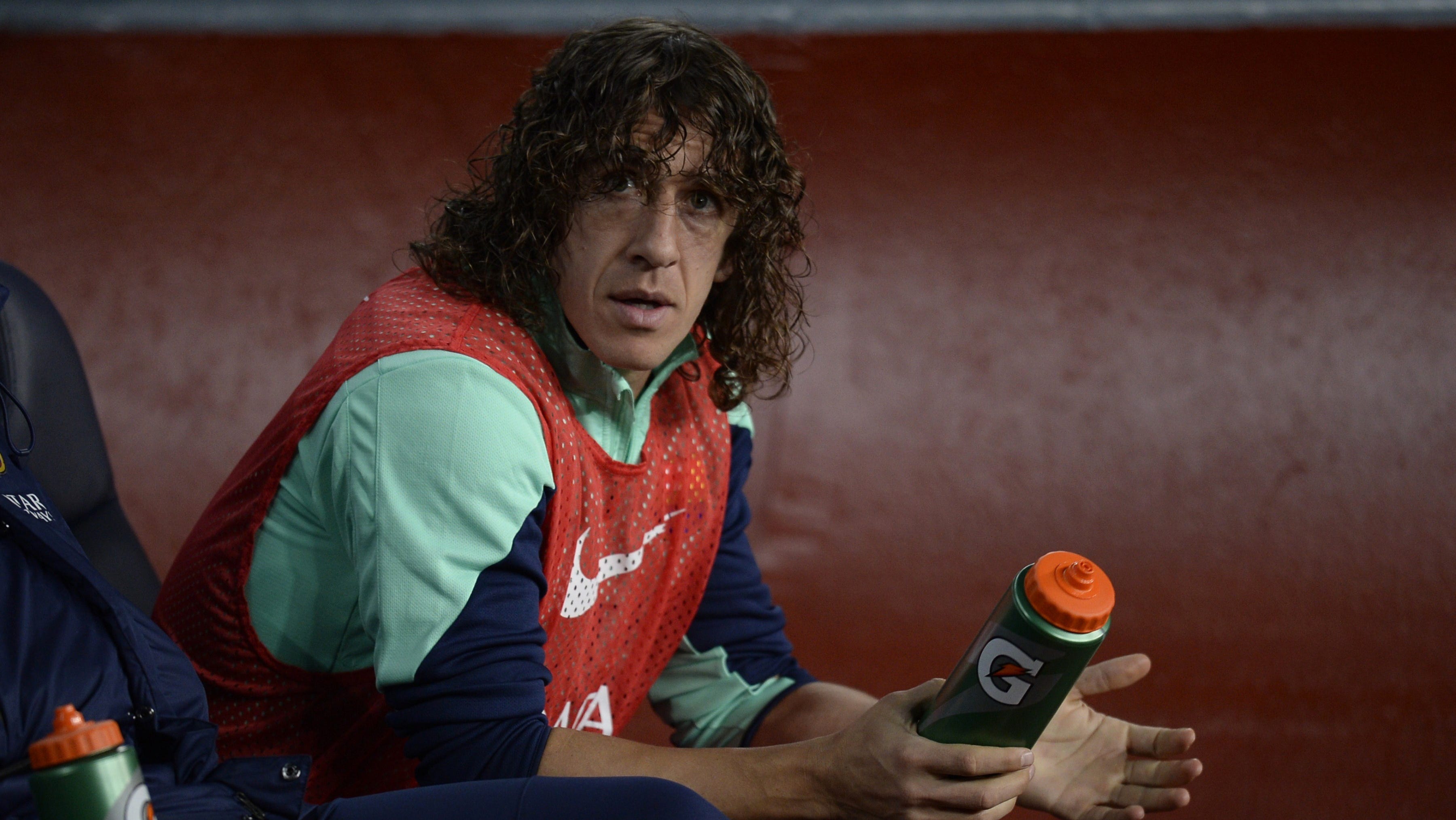 Barcelona's Carles Puyol sidelined with bruised leg