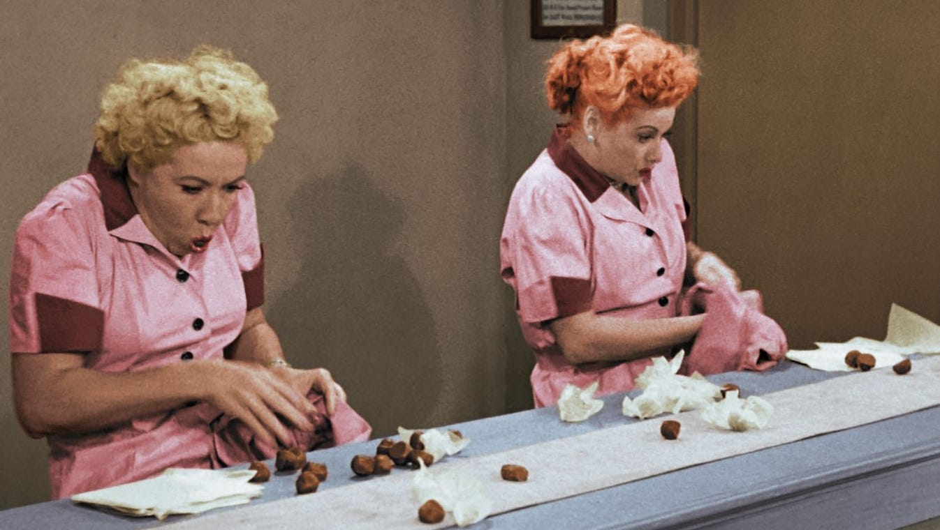 Ethel and Lucy work the line at the candy factory in a classic scene ...