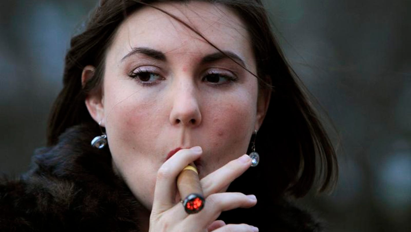 More women are smoking cigars, but "feminized" flavors can come with a risk