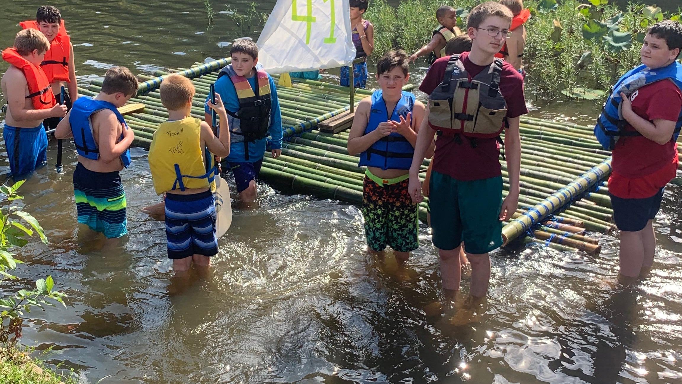 Boy Scouts build raft at camp out