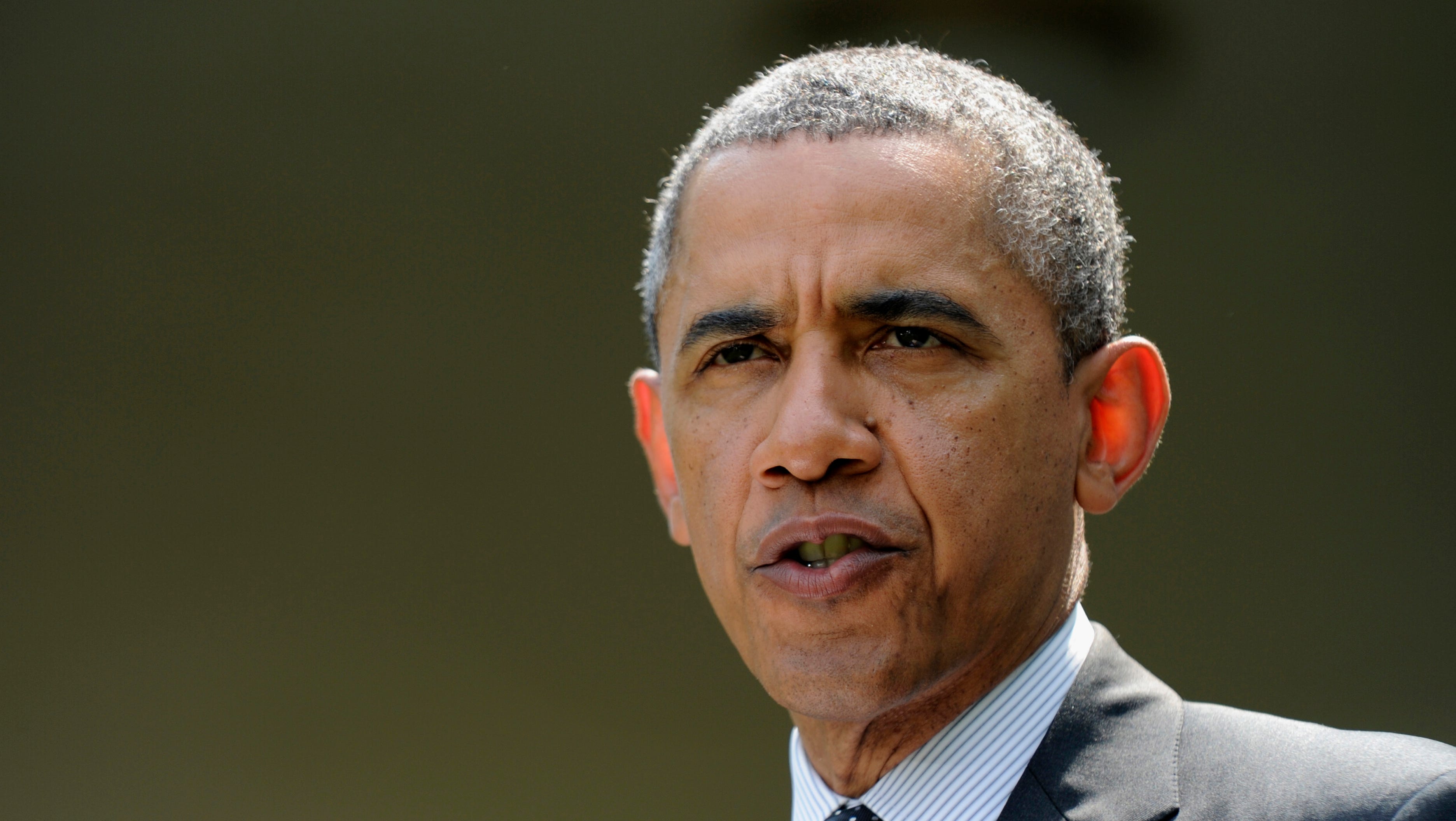Obama appeals for calm in Missouri, lauds Iraq progress