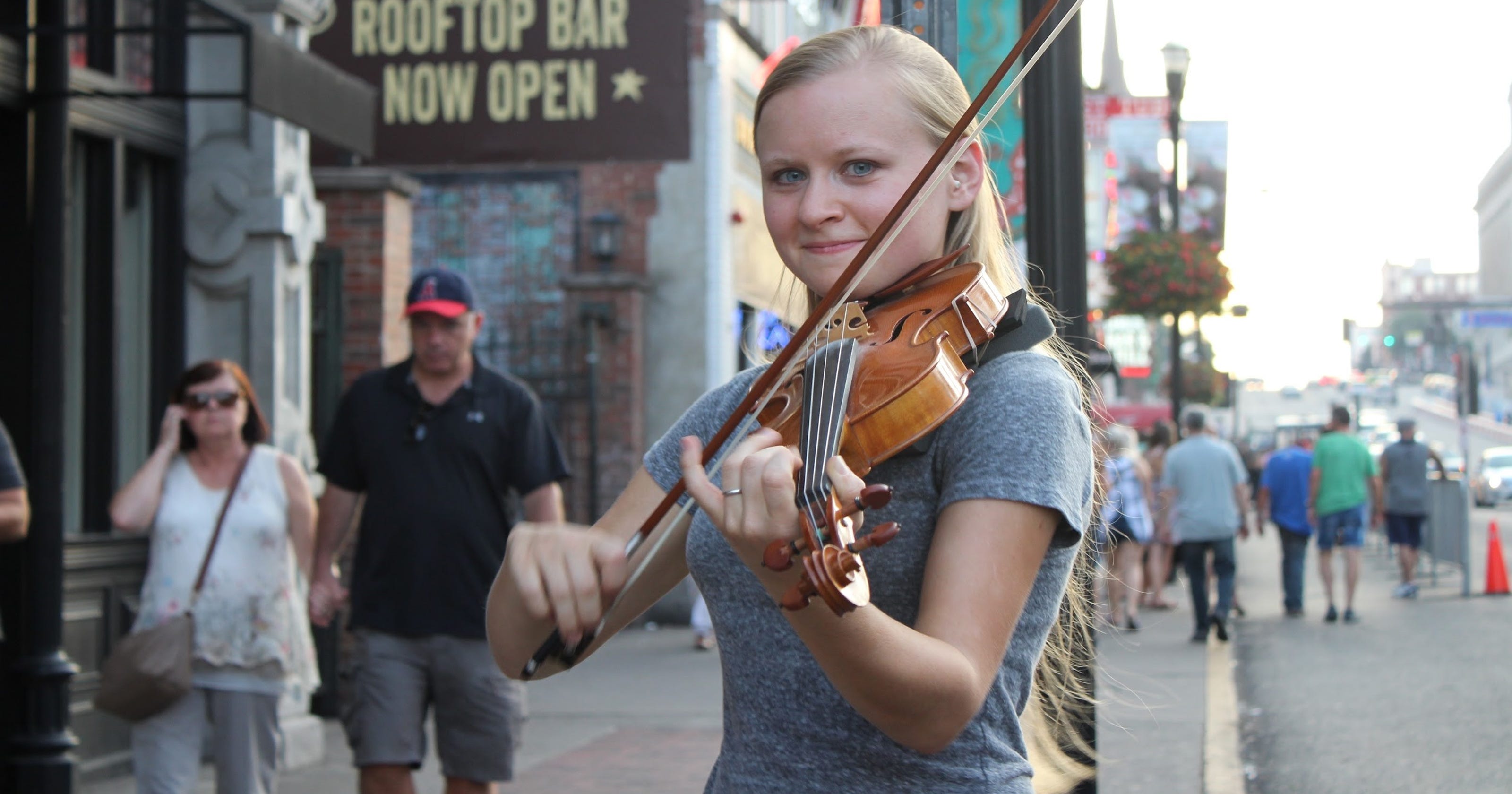 MTSU grad Hillary Klug uses her feet and fiddle to busk full time on ...