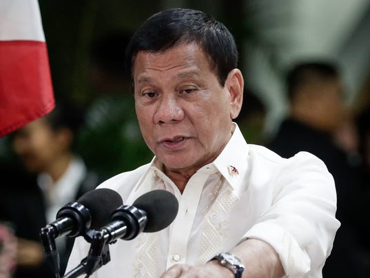 Duterte's bloody drug war draws potent foe: Catholic church