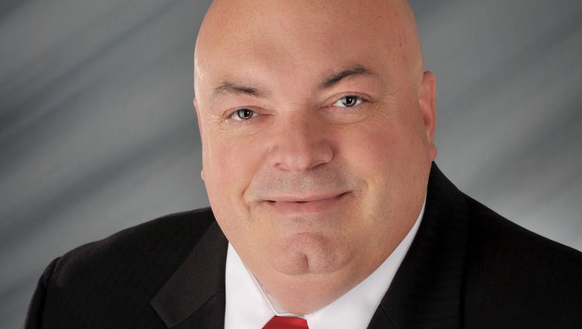 Hamman supporter slams opponent's father