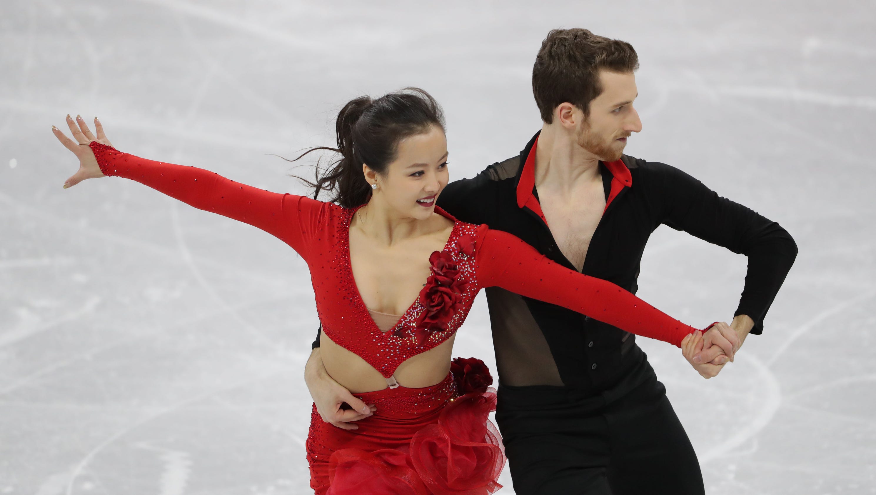 Watch: Wardrobe malfunction nearly derails Olympic ice dancing event