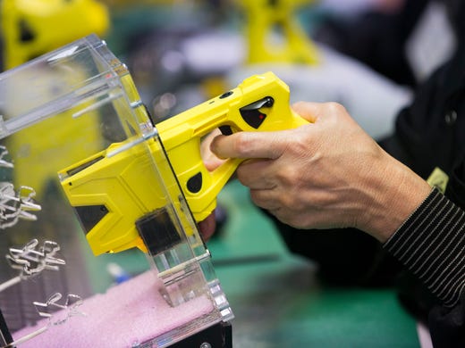 Taser offers free body cameras to police, changes name to Axon