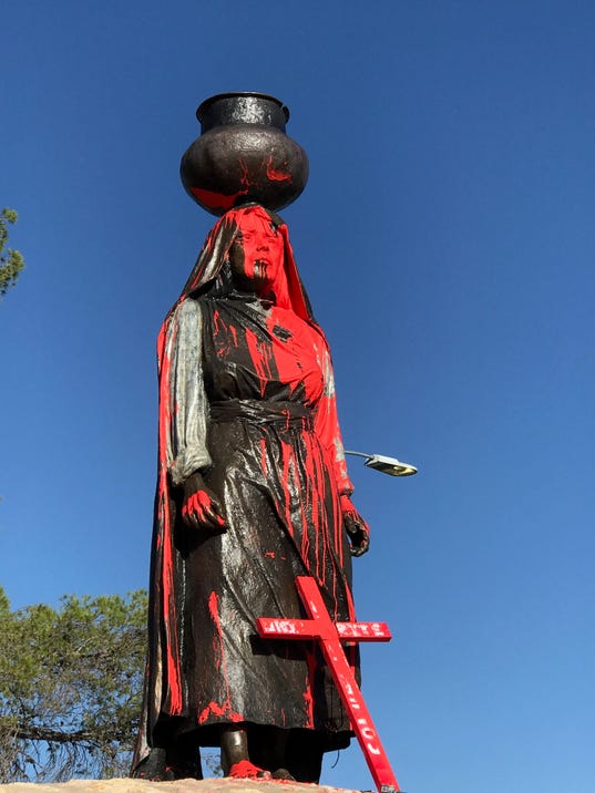 Tigua sculpture vandalized with red paint on Columbus Day