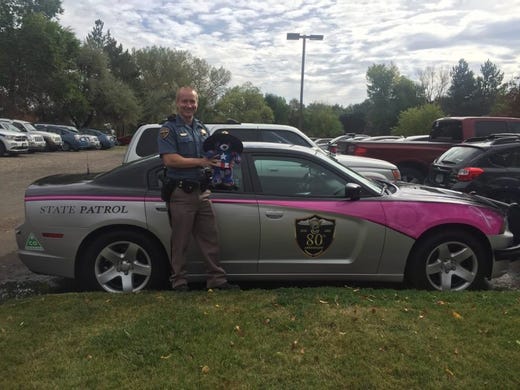 Cop car goes pink for breast cancer awareness