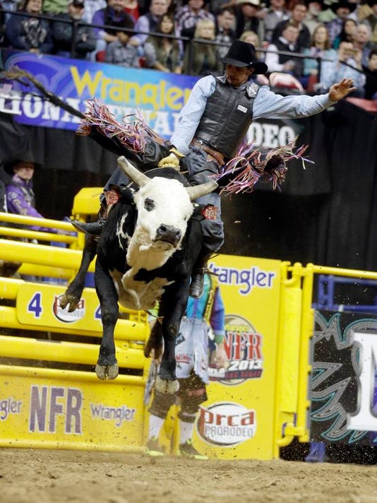 National Finals Rodeo: J.W. Harris wins fourth bull riding season title