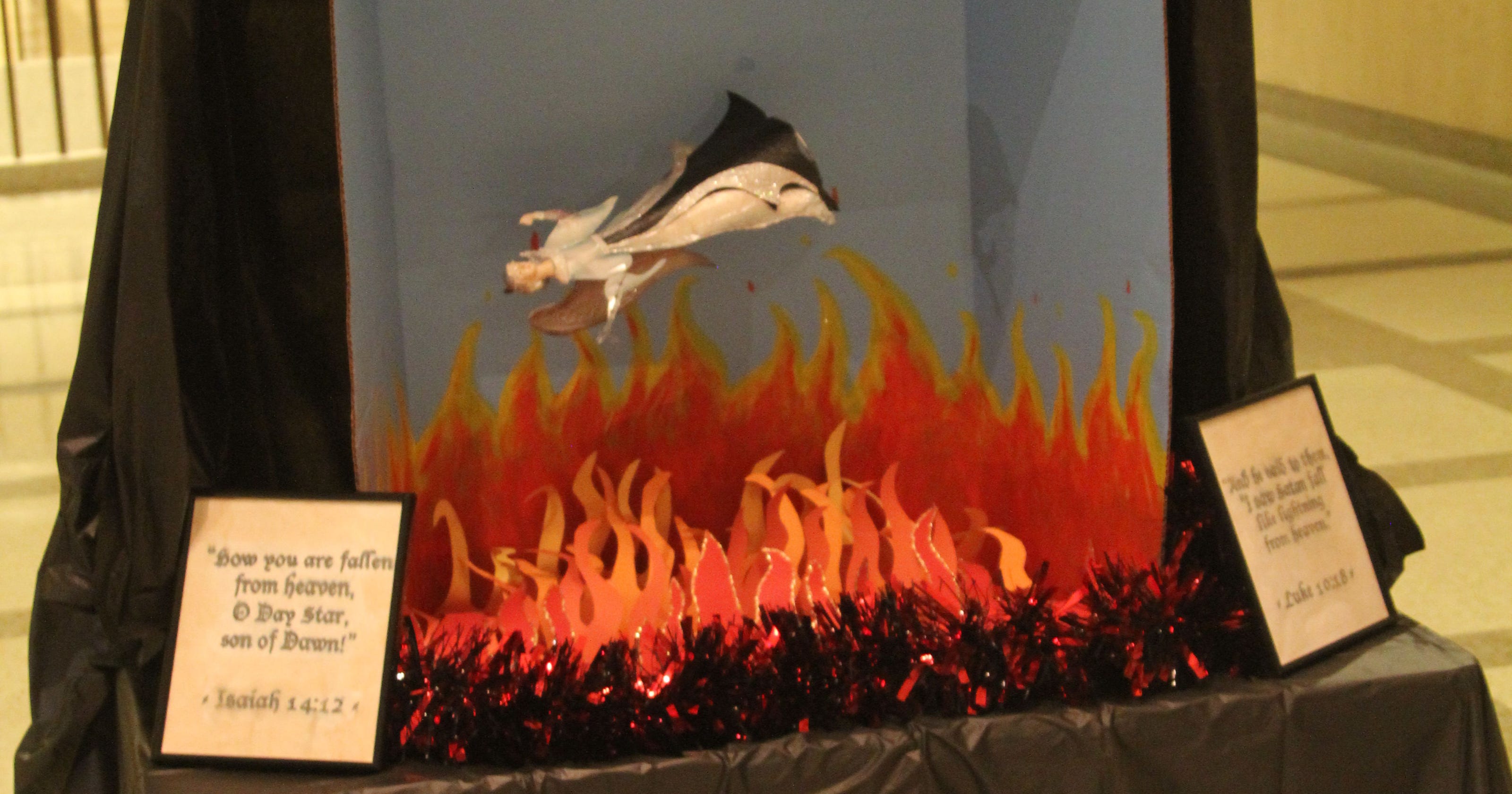 Woman arrested in attack on Satanic Temple display