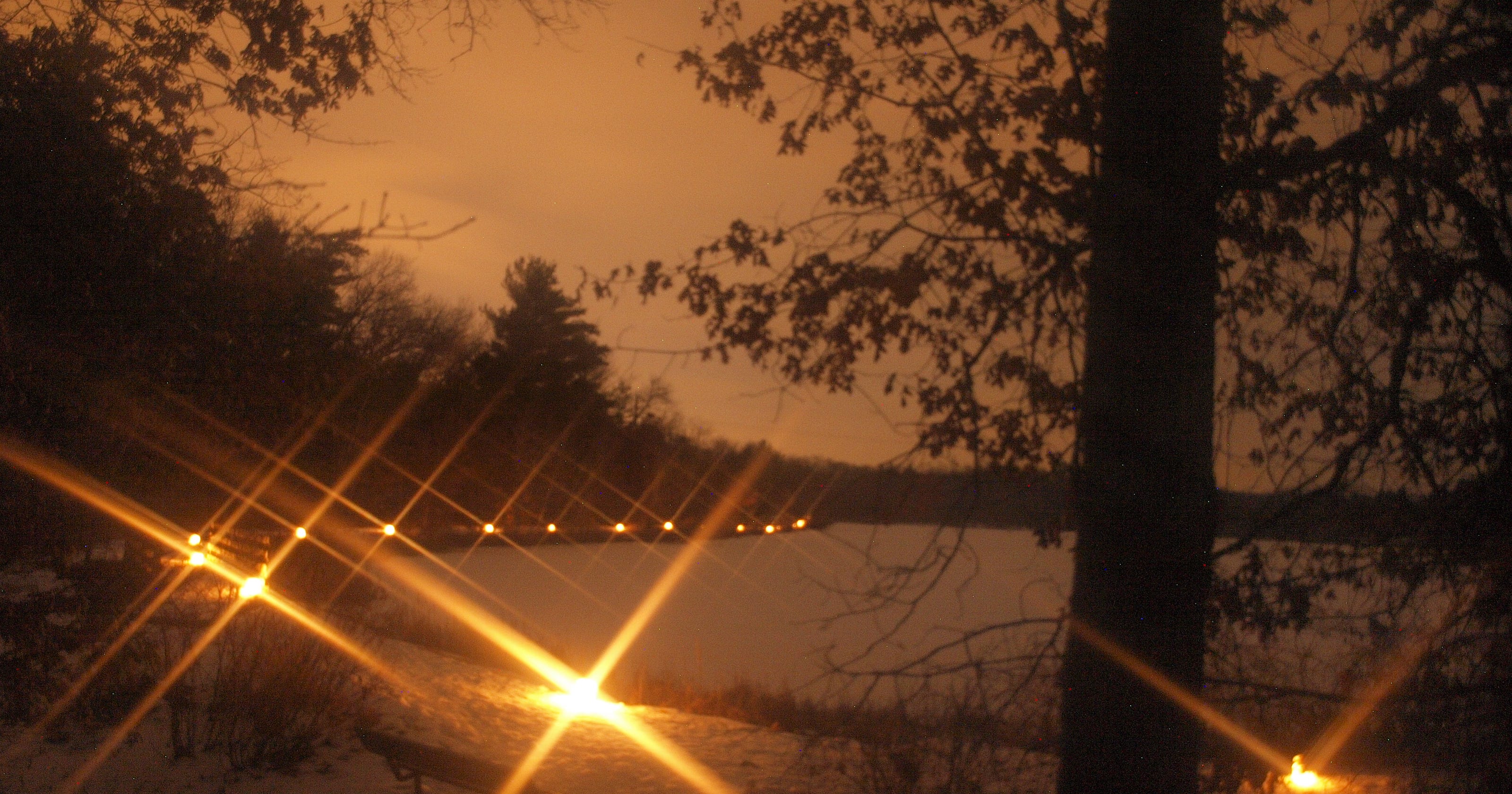 Candlelight ski, snowshoe events light up state parks