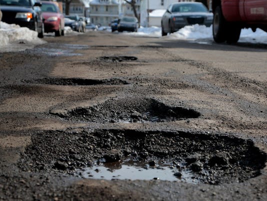 Speed, not pothole, caused traffic death in Michigan, police say