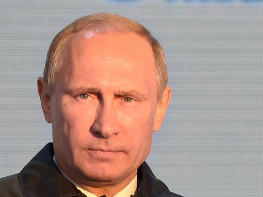 Dangerous to cheer Vladimir Putin: Your Say