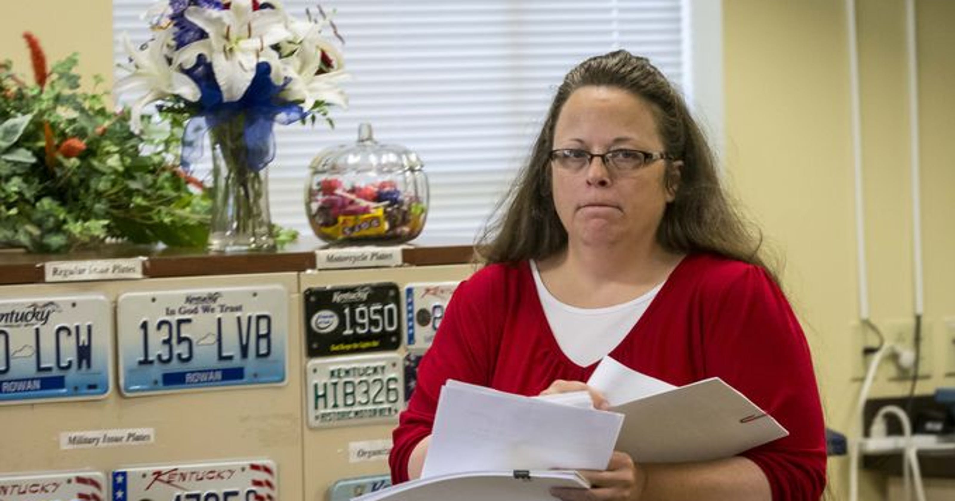 Couples want Kim Davis to stop altering forms