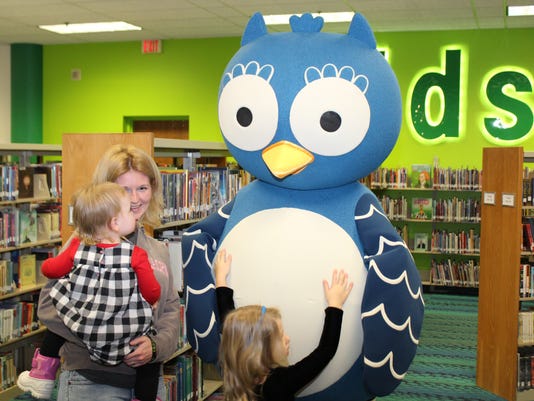 Library unveils new kids' area, mascot
