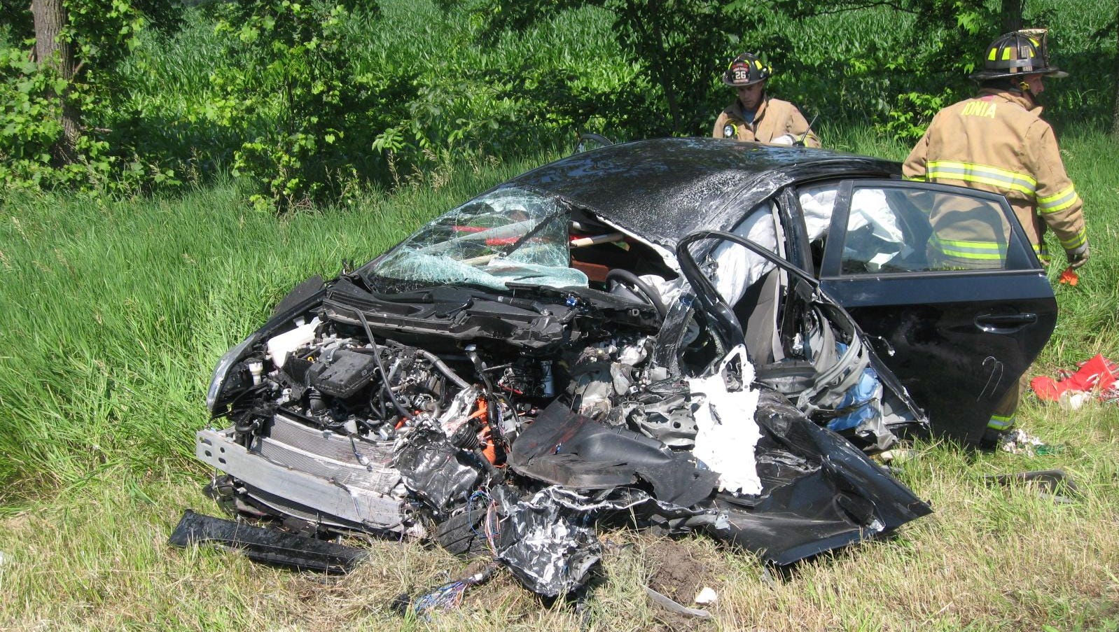 One injured in crash between Prius, semi