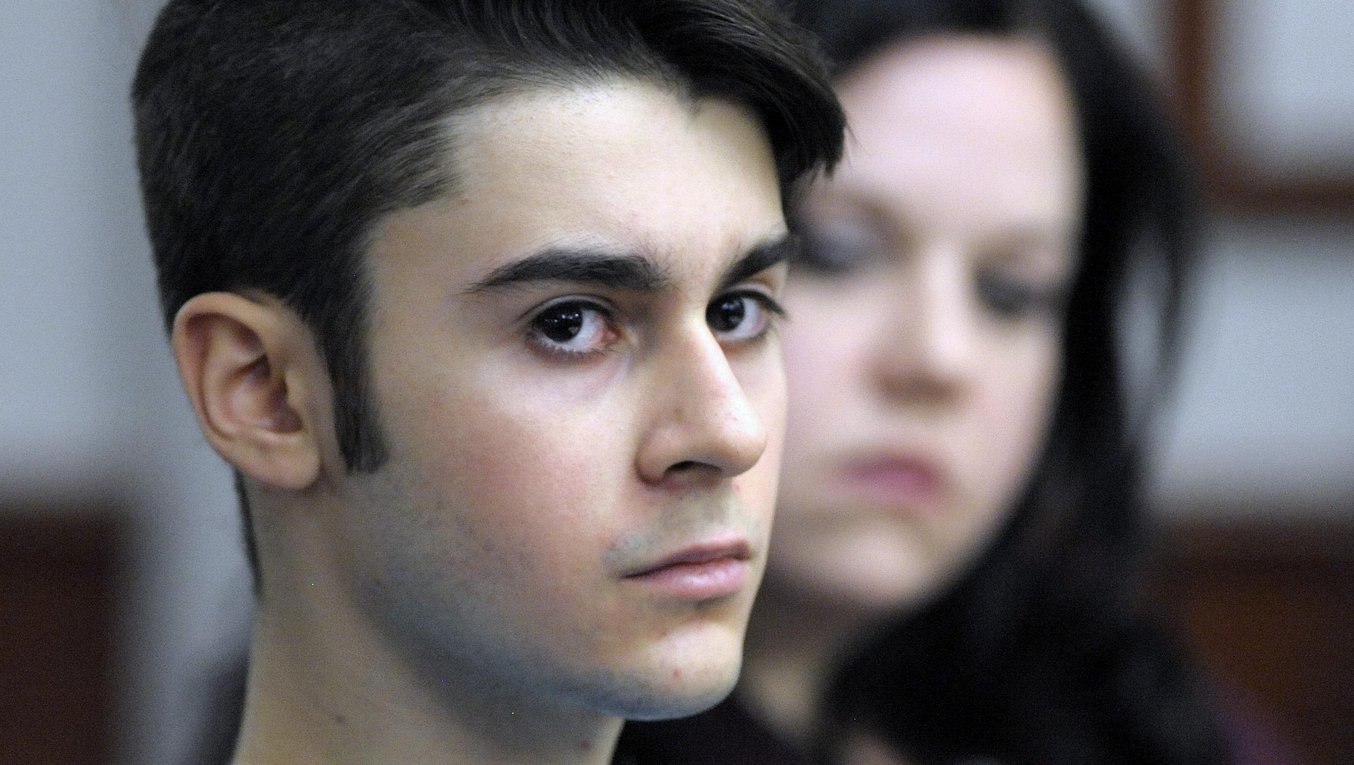 Suit: Teen charged in mom's death had been hurt in crash