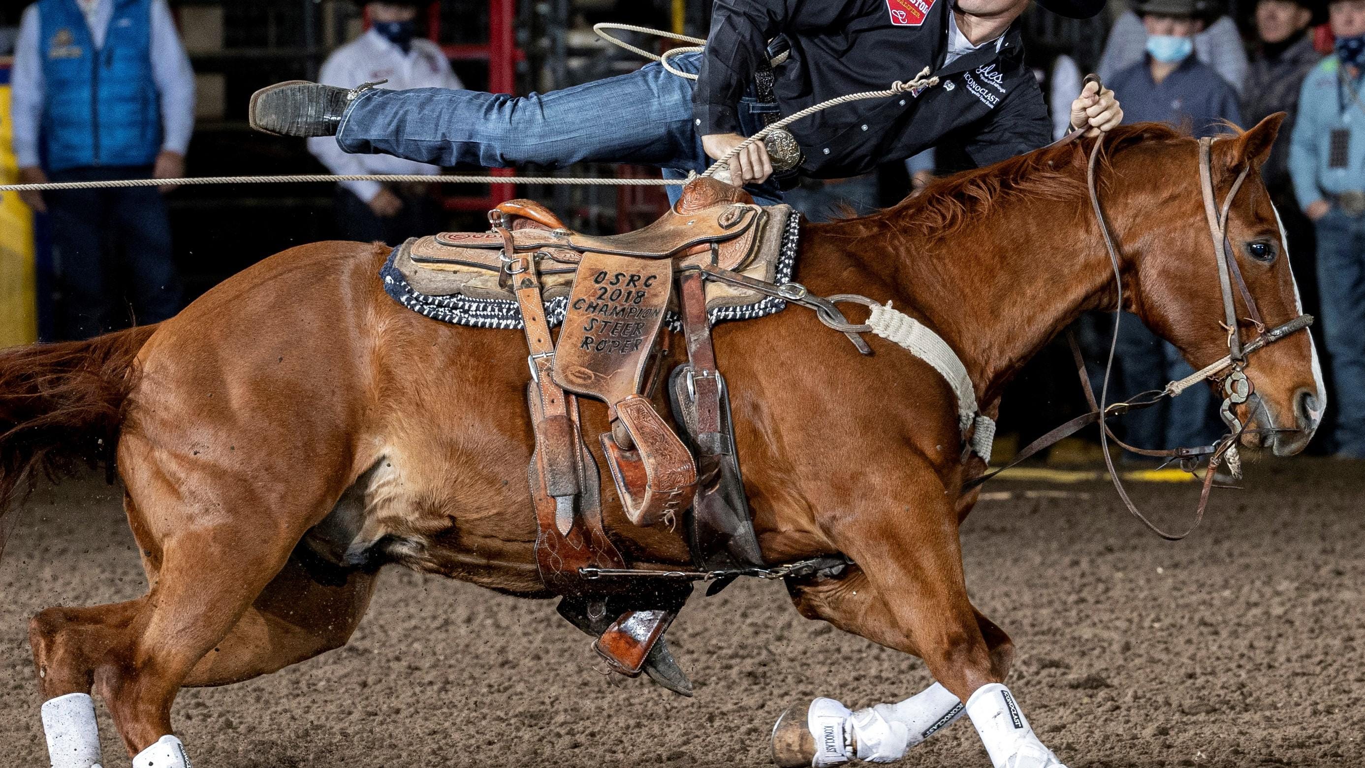 Two Kansas cowboys are tops in steer roping -- and they are father and son