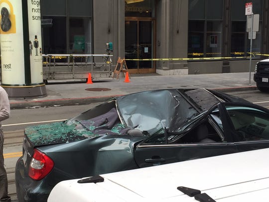 Window washer falls 11 stories, survives