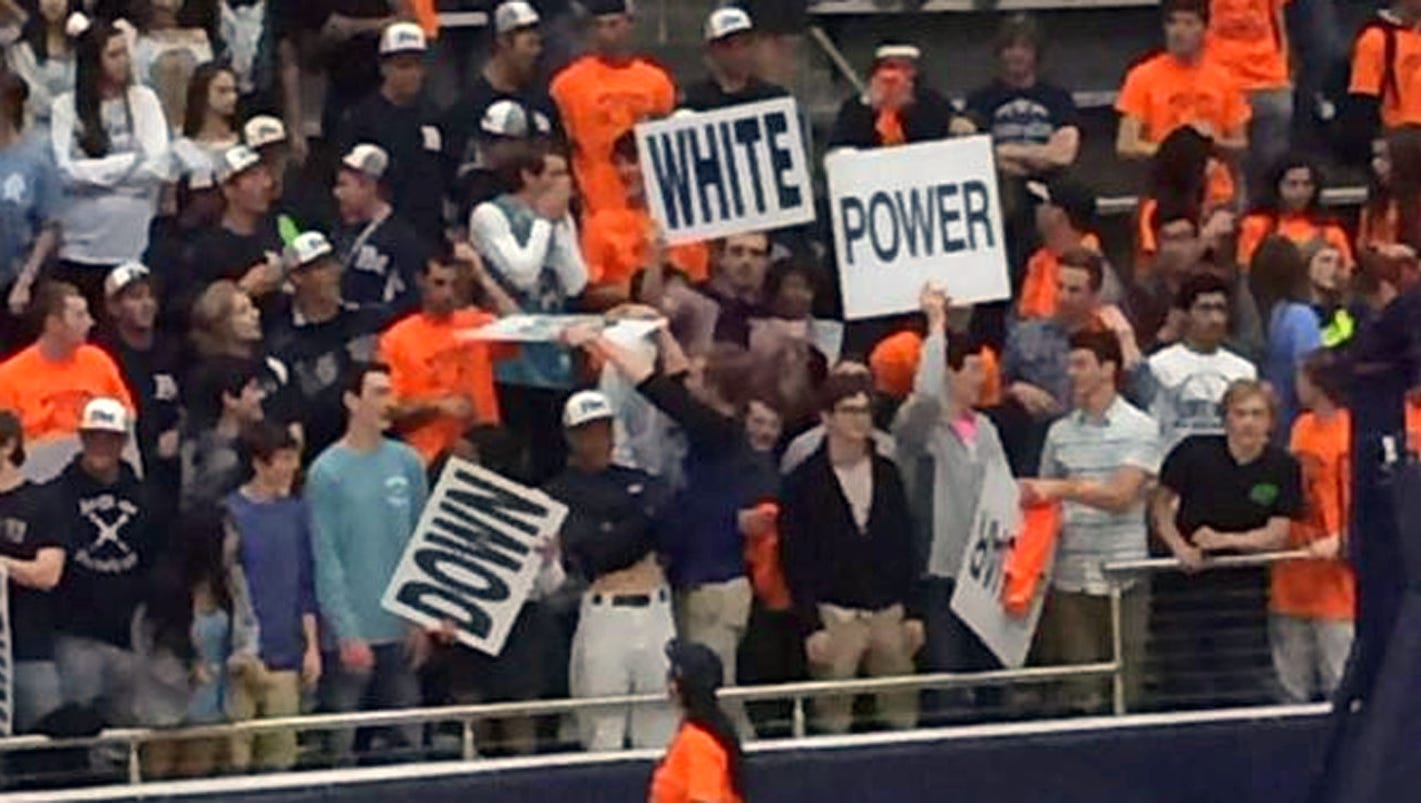 Parents, students decry 'white power' signs at game