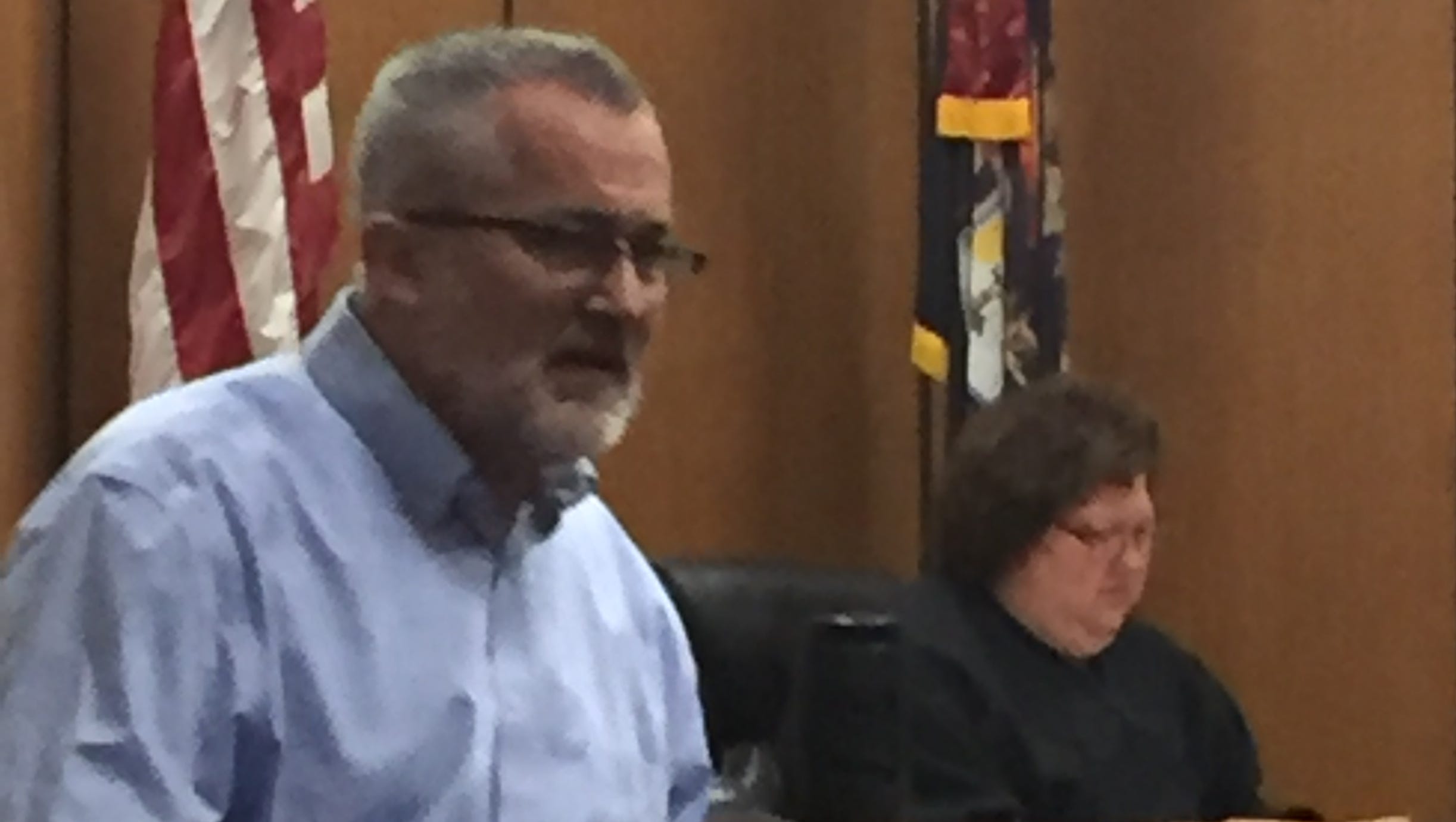 Catholic priest resentenced to prison time in charity theft