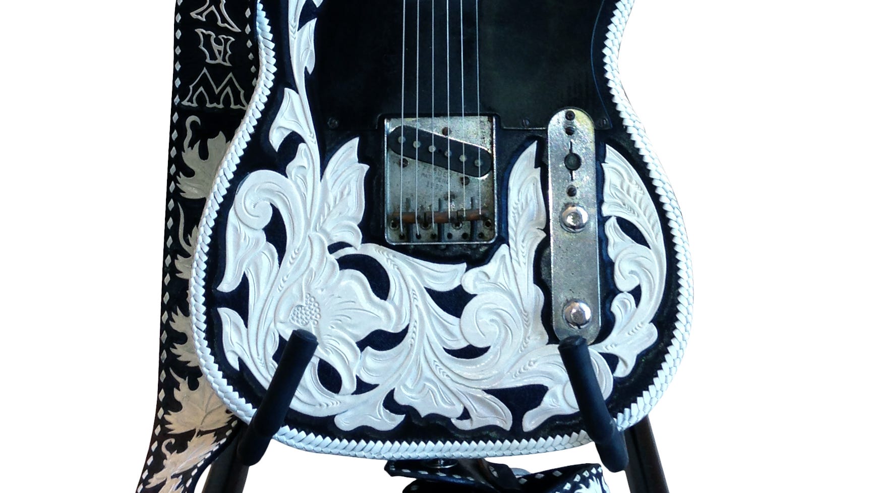 Waylon Jennings auction: Guitars, Buddy Holly's bike