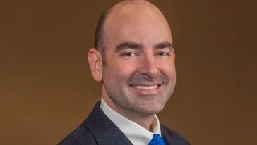 How can we coordinate condo road and parking maintenance efforts?