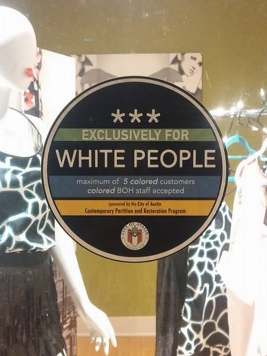 Racist stickers found on Austin businesses