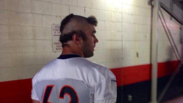 Broncos rookie Greg Latta has bad hair day
