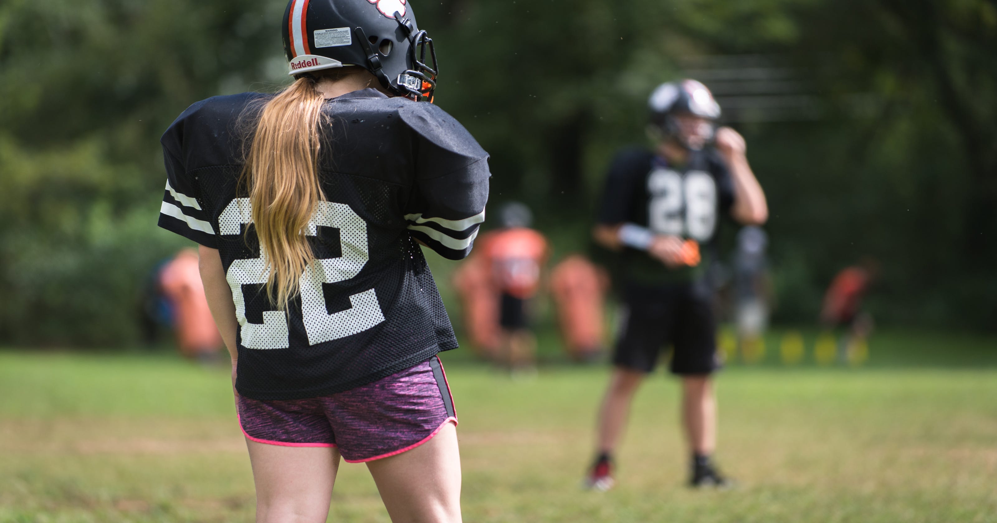 Female athletes tackle high school football in WNC