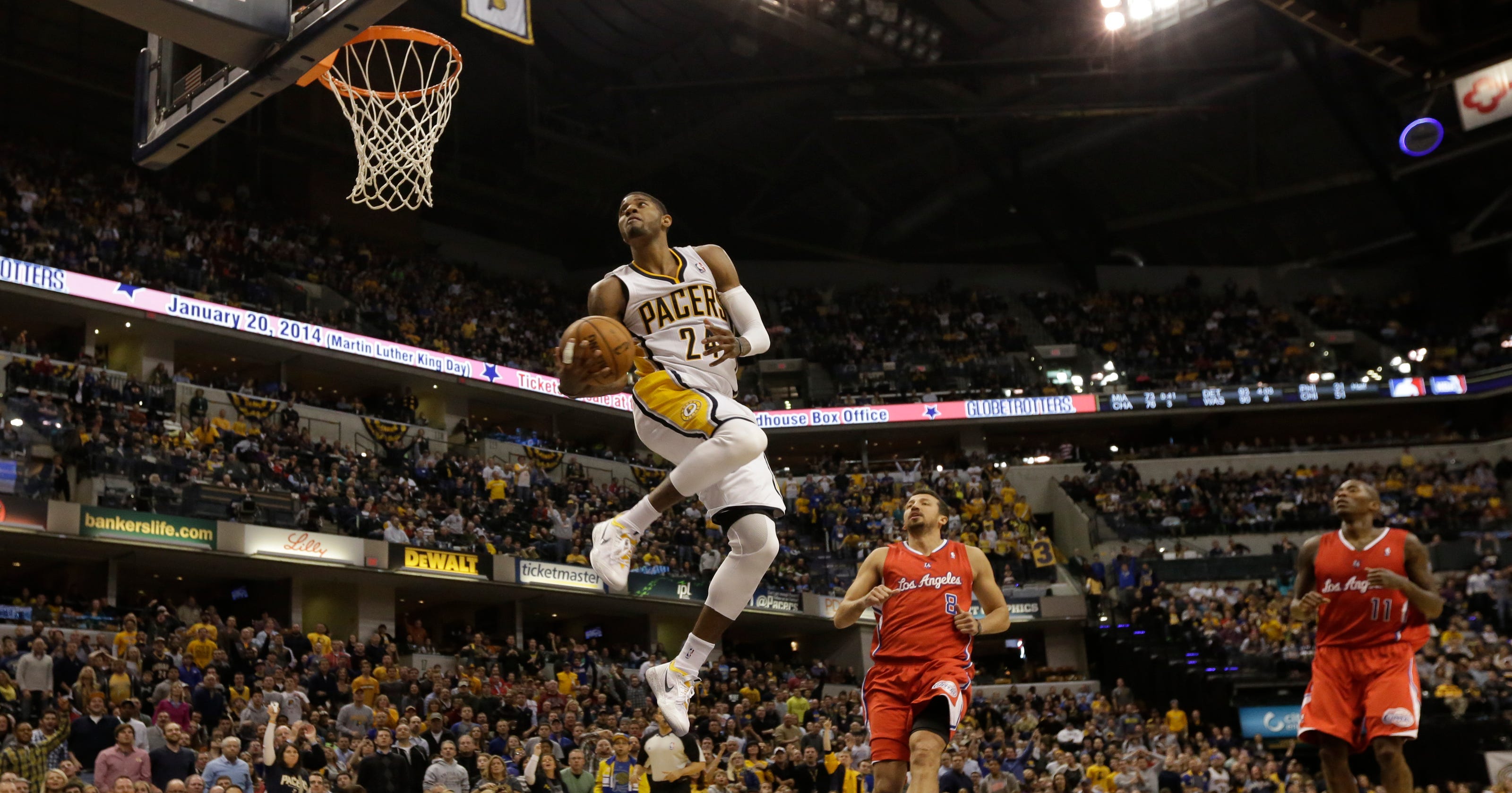 Paul George dazzles the crowd with a 360 dunk