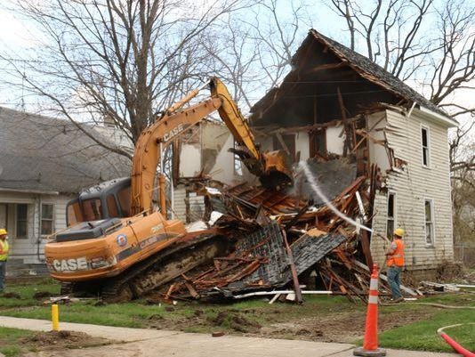 State notes firing, reassignment over Detroit demo probe