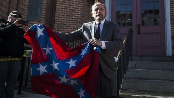 Watch: Activist burns Confederate/Nazi flag in Gettysburg