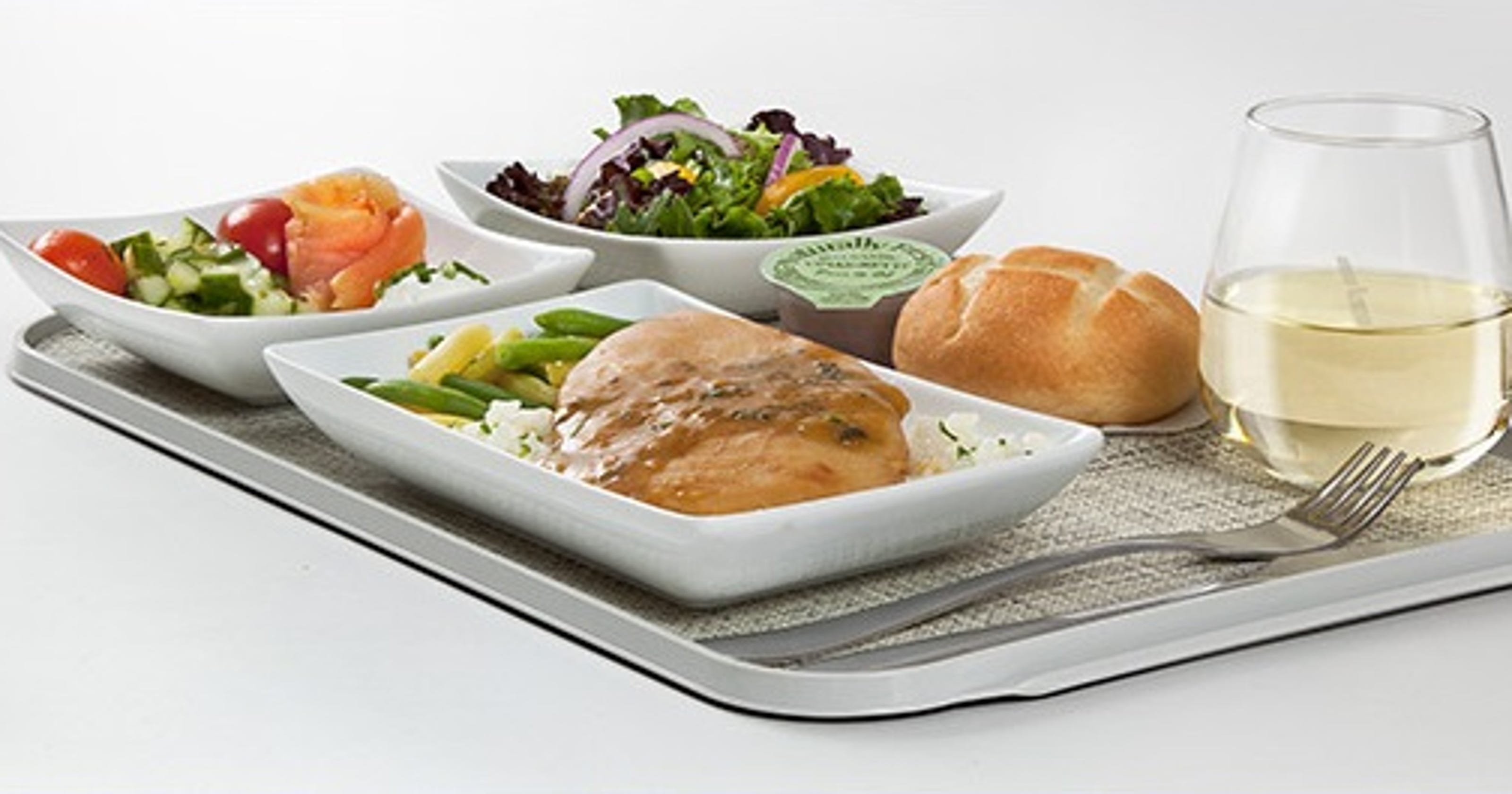 American to pare first-class meals on shorter flights