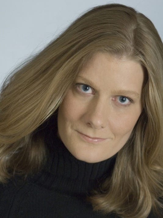 Front Row: Dickson juggles many roles