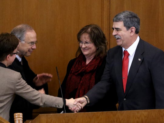 Rick Lewis takes oath
