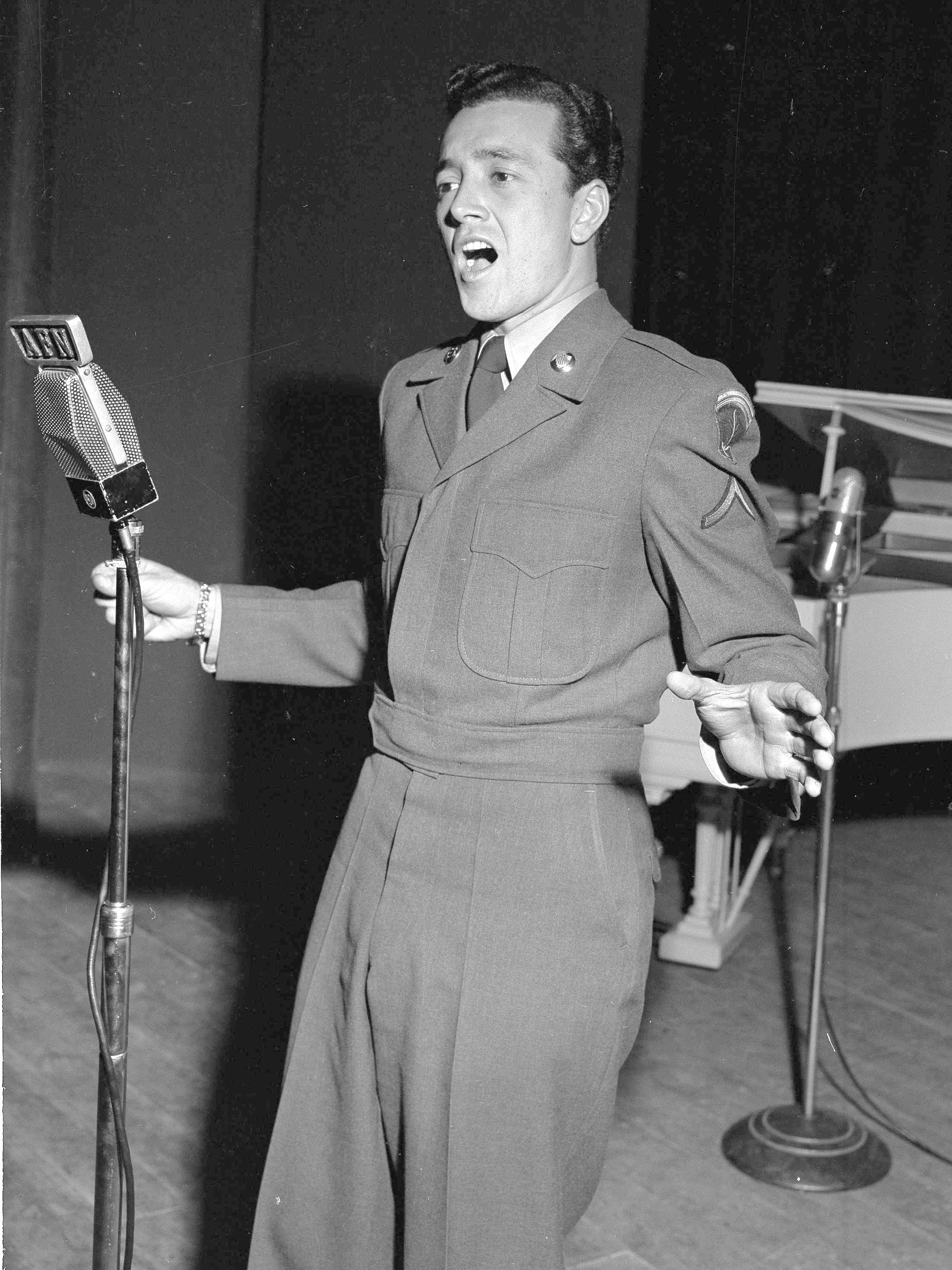 Vic Damone, barely 21 years old, can't believe what he's hearing.