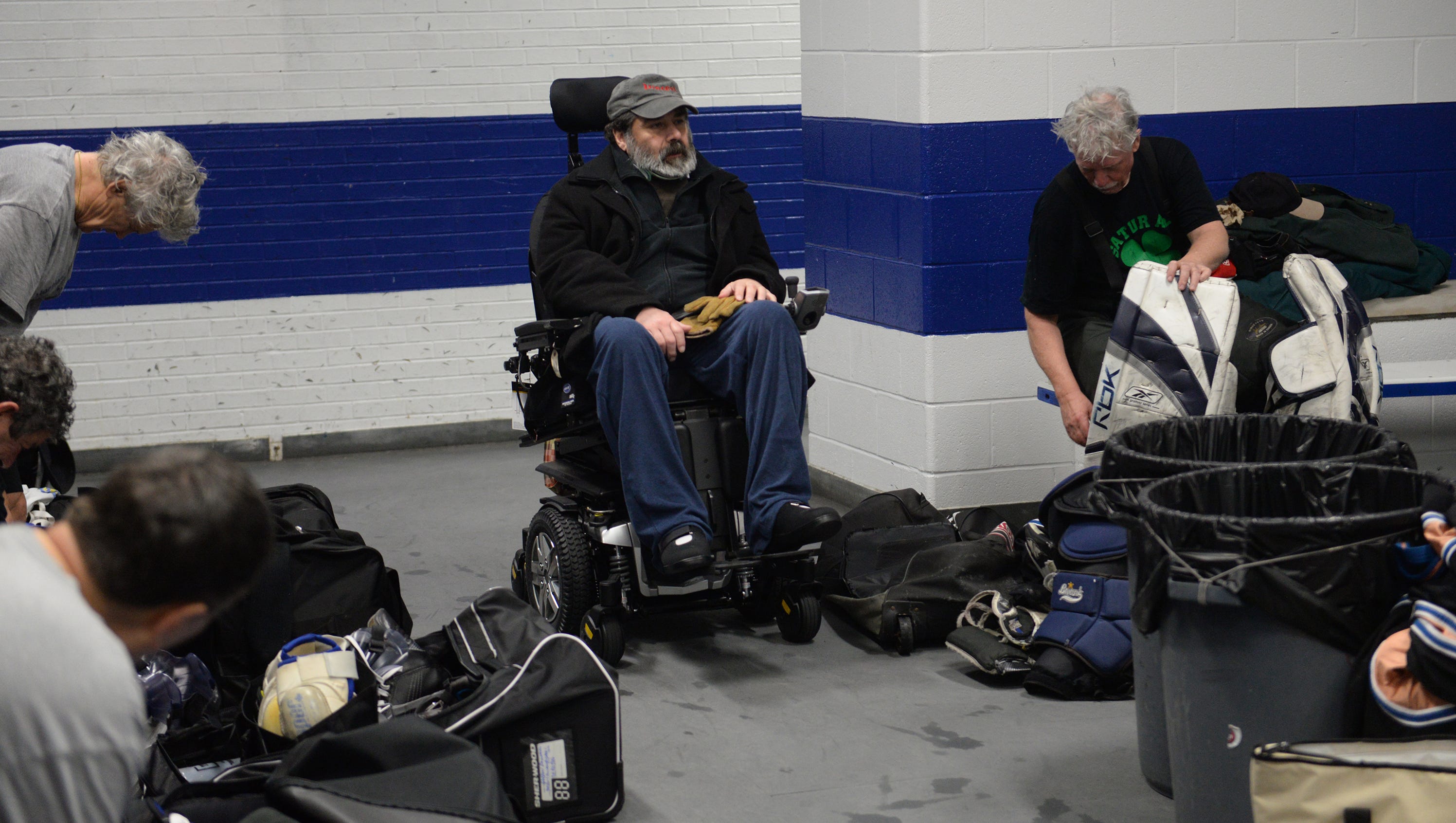 "Father D" returns to ice rink after serious spinal cord injury