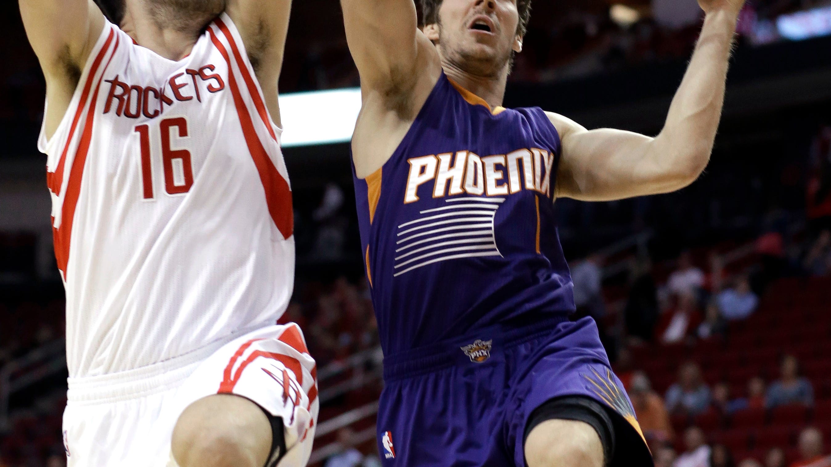 Jones leads Rockets to 95-92 win over Suns