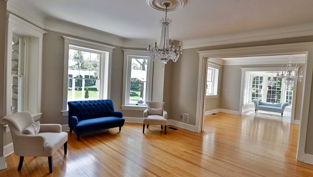 What is the history of the old stone buildings along Haseltine Road?