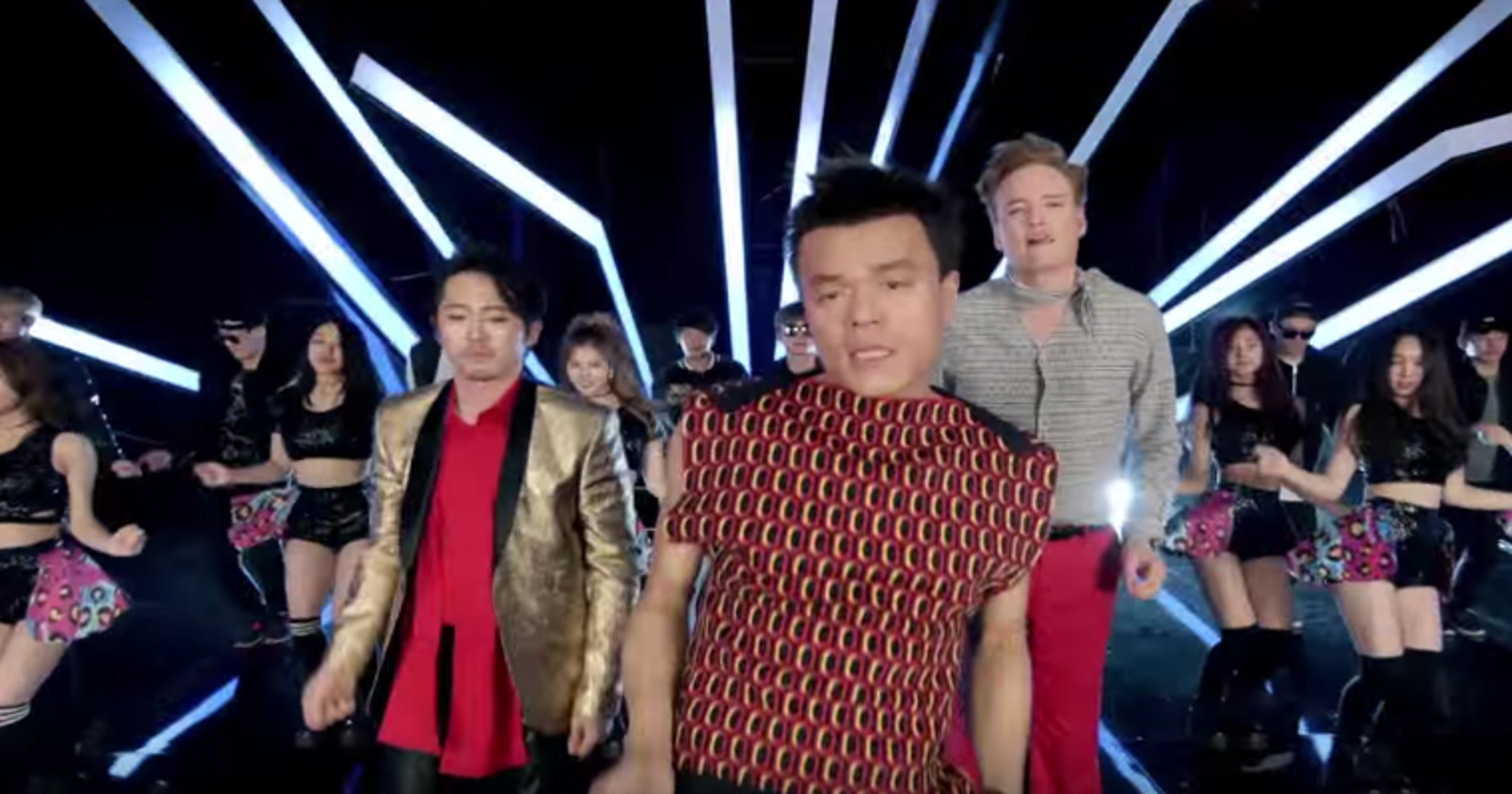 Conan, Steven Yeun don eyeliner in J.Y. Park's k-pop video, 'Fire'