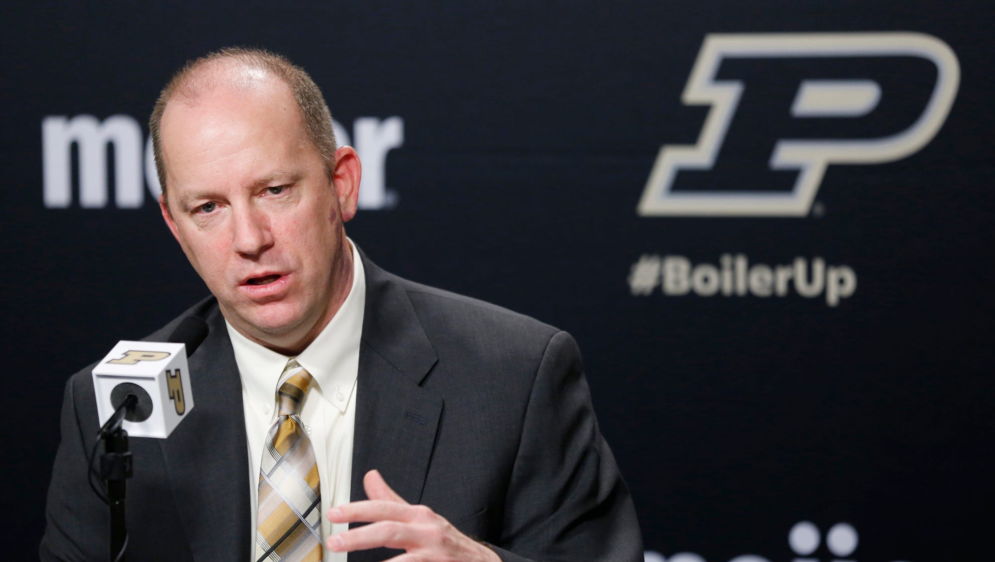 Purdue football assistants signed through 2018